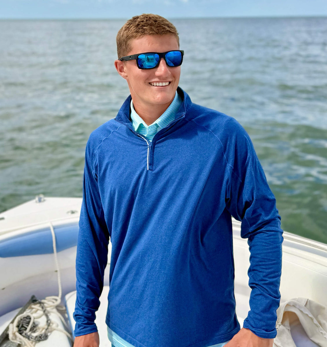 Skiff Dogs: Ocean Flex Quarter Zip - Tidal Blue – Collared Greens